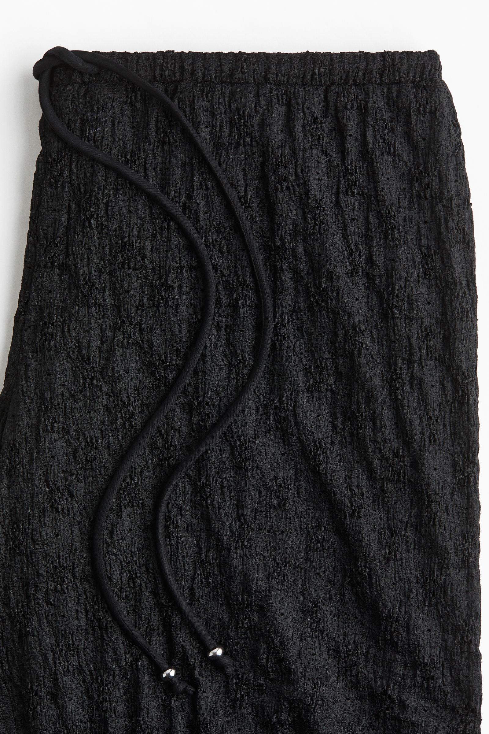 Pantalón efecto encaje con cordón de ajuste | H&M